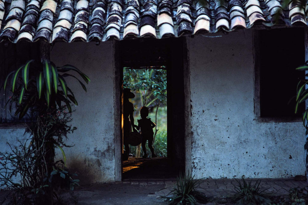Silhouetted People in Doorway, Bahia – Jay Maisel