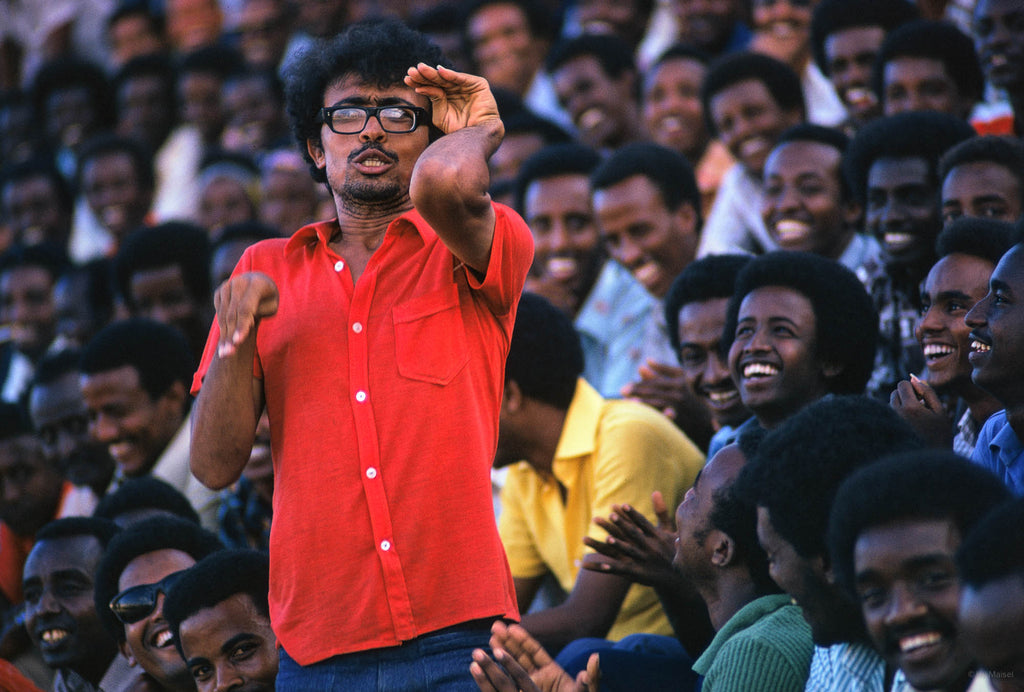 Man in Red Mocking Salute, Somalia – Jay Maisel