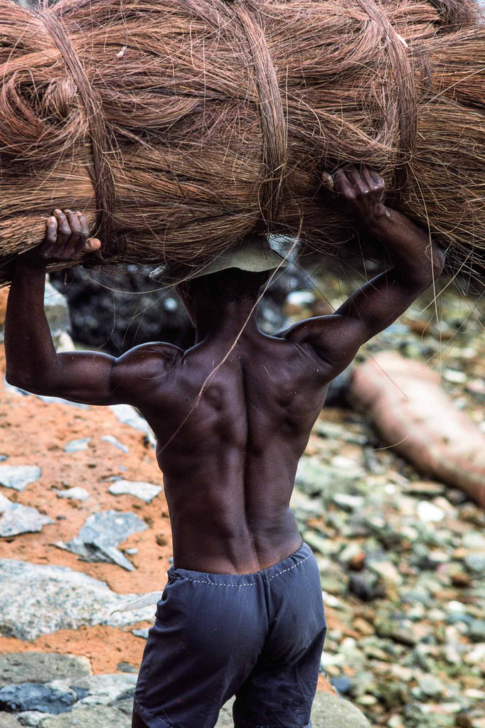 Back of Man Carrying Heavy Load, Bahia – Jay Maisel