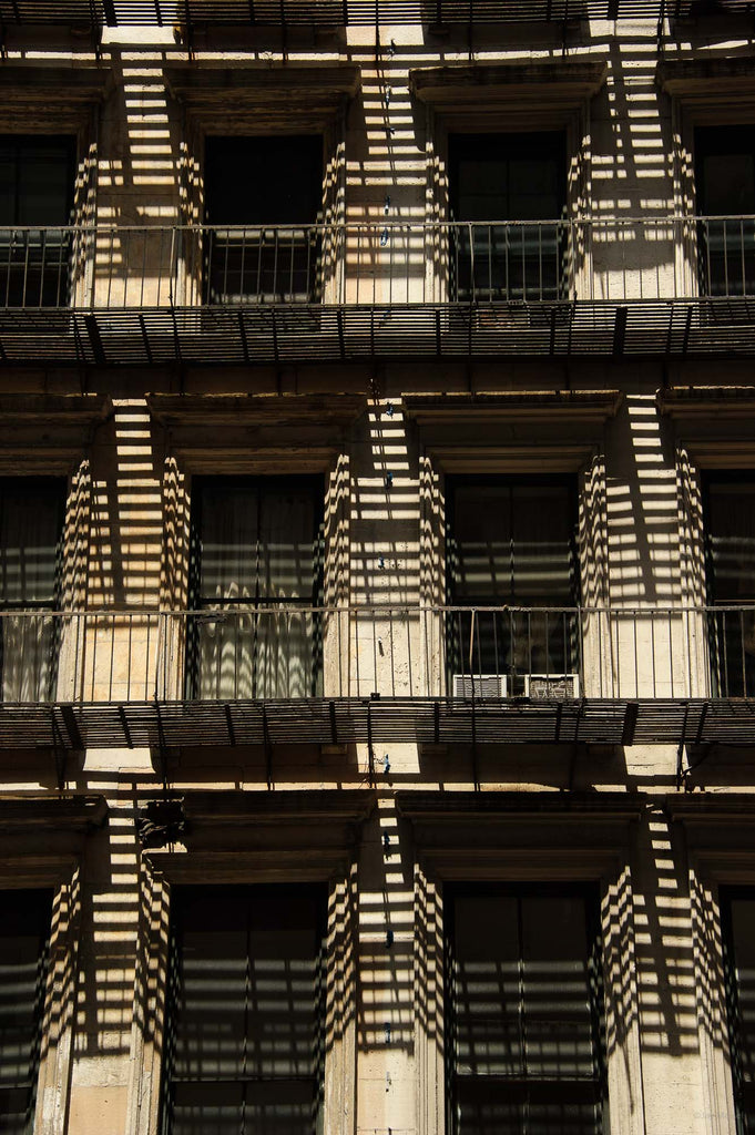 Building with Harsh Light 1, NYC – Jay Maisel