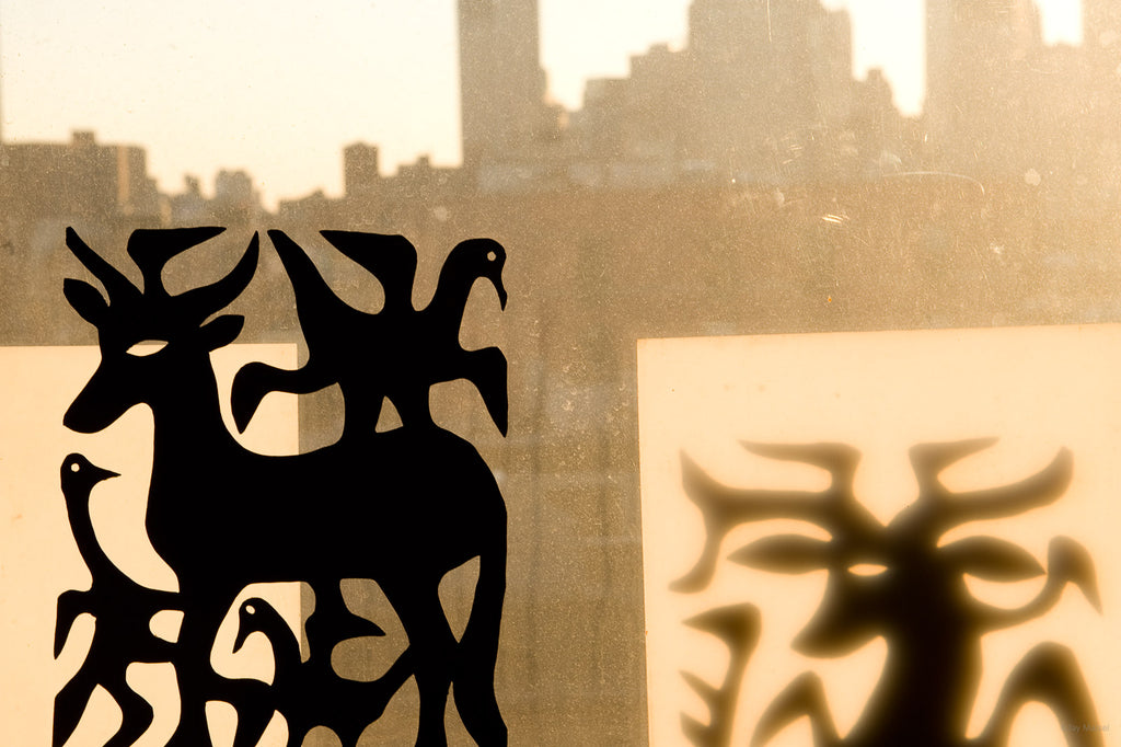 Haitian Metal Art Against Window – Jay Maisel