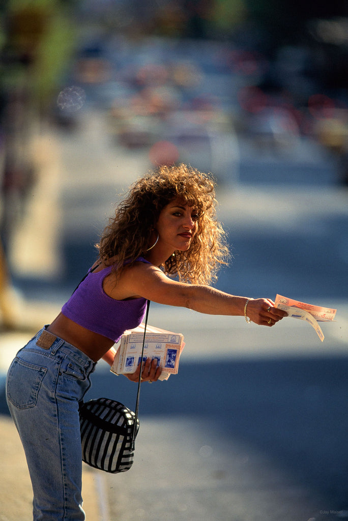 Woman Handing Out Flyers, NYC – Jay Maisel